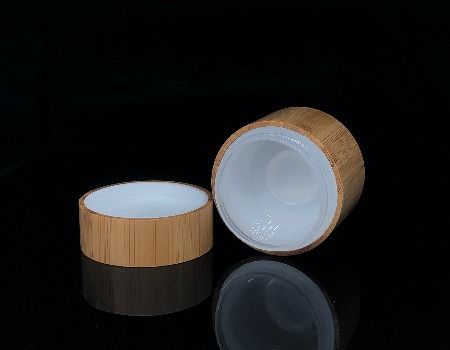 China Wholesale bamboo aluminum cream container with bamboo lid on ...