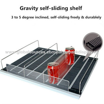 Gravity sliding shelf for display showcase, freezer and fridges ...