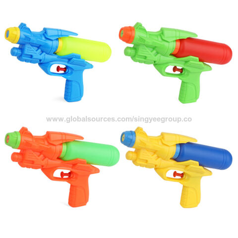 Children's toy water guns outdoor rafting on the beach in summer Water ...