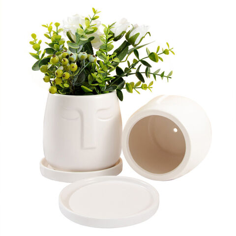 China Modern ceramic face flower pot and planter for gardend deocration ...