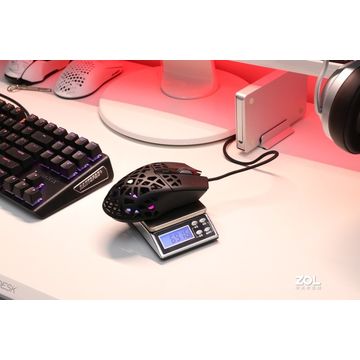 China Ultra Light Weight RGB Gaming Mouse With Holes Ergonomic Design ...