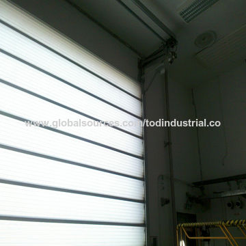 China Vertical Stacking Sectional Doors,Compact Sectional Industrial ...