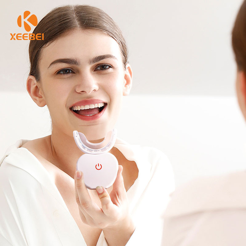 China Led teeth whitening machine portable rechargeable snow teeth ...